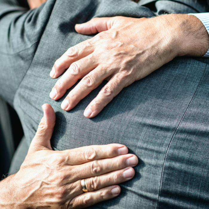 Handshakes to Hugs - Between a Laugh and a Tear